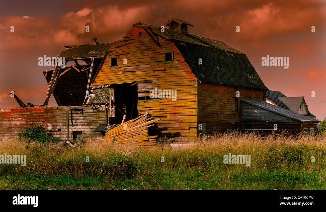 Amazing light after the storm, abandoned barn Stock Photo - Alamy