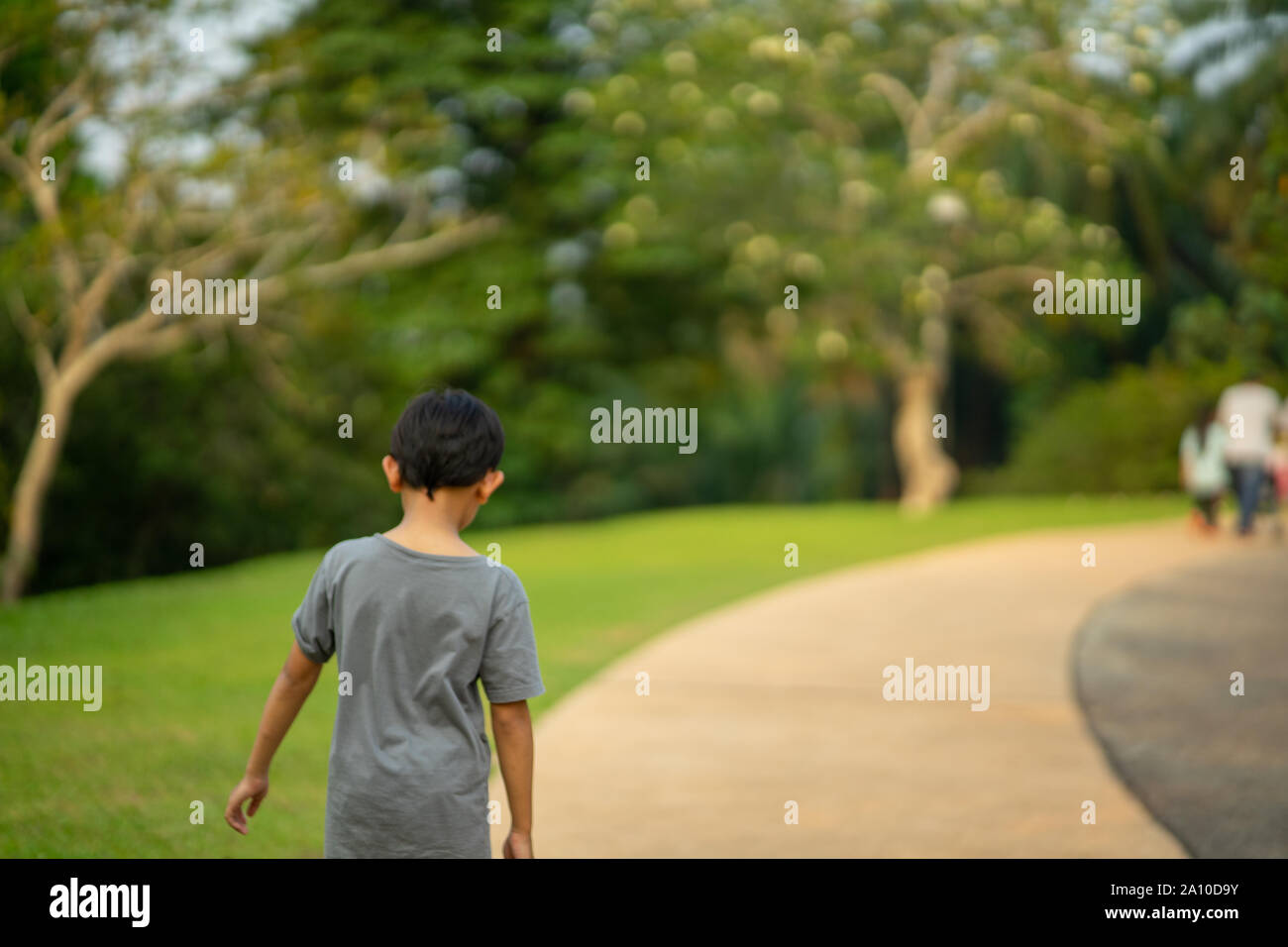 Kid walking alone hi-res stock photography and images - Alamy