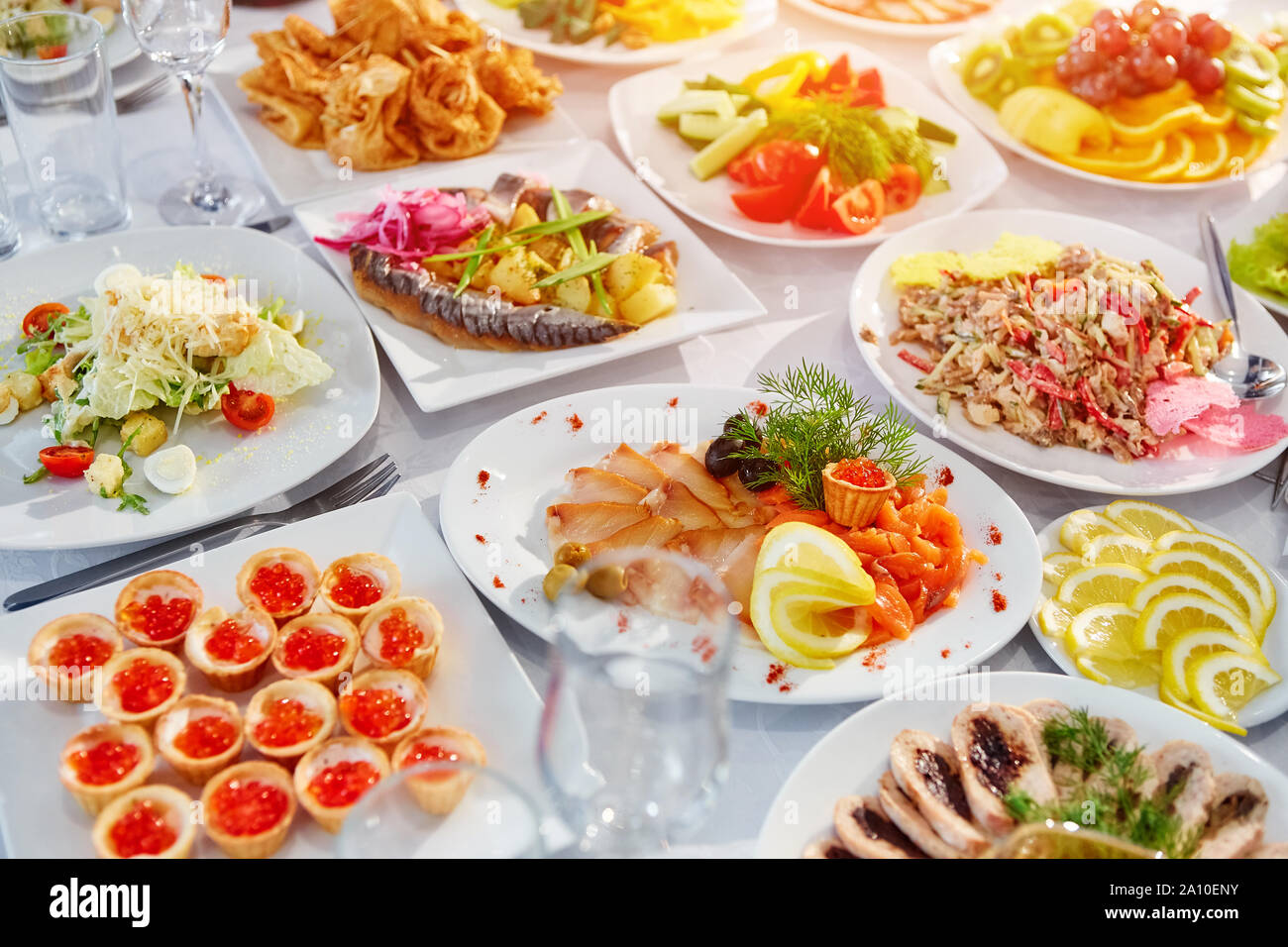 Table with food and drinks in a restaurant Stock Photo - Alamy