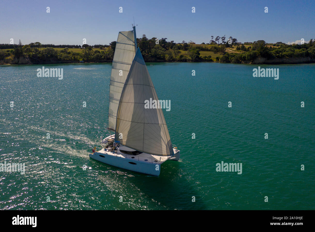 Cruising Catamaran sailing yacht under sail, shot from the air Stock ...