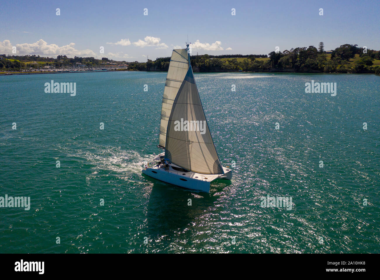 Cruising Catamaran sailing yacht under sail, shot from the air Stock ...