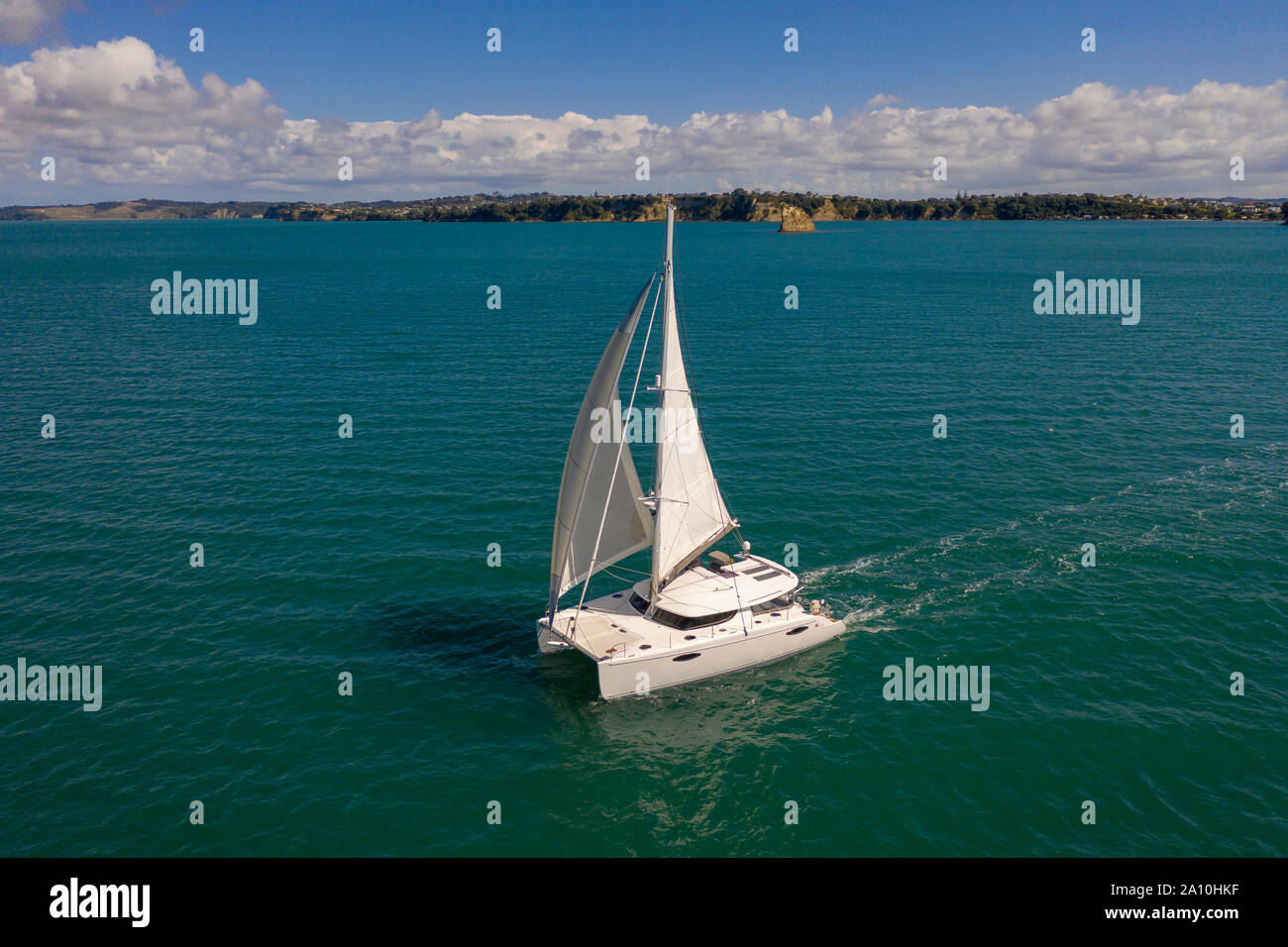 Cruising Catamaran sailing yacht under sail, shot from the air Stock ...