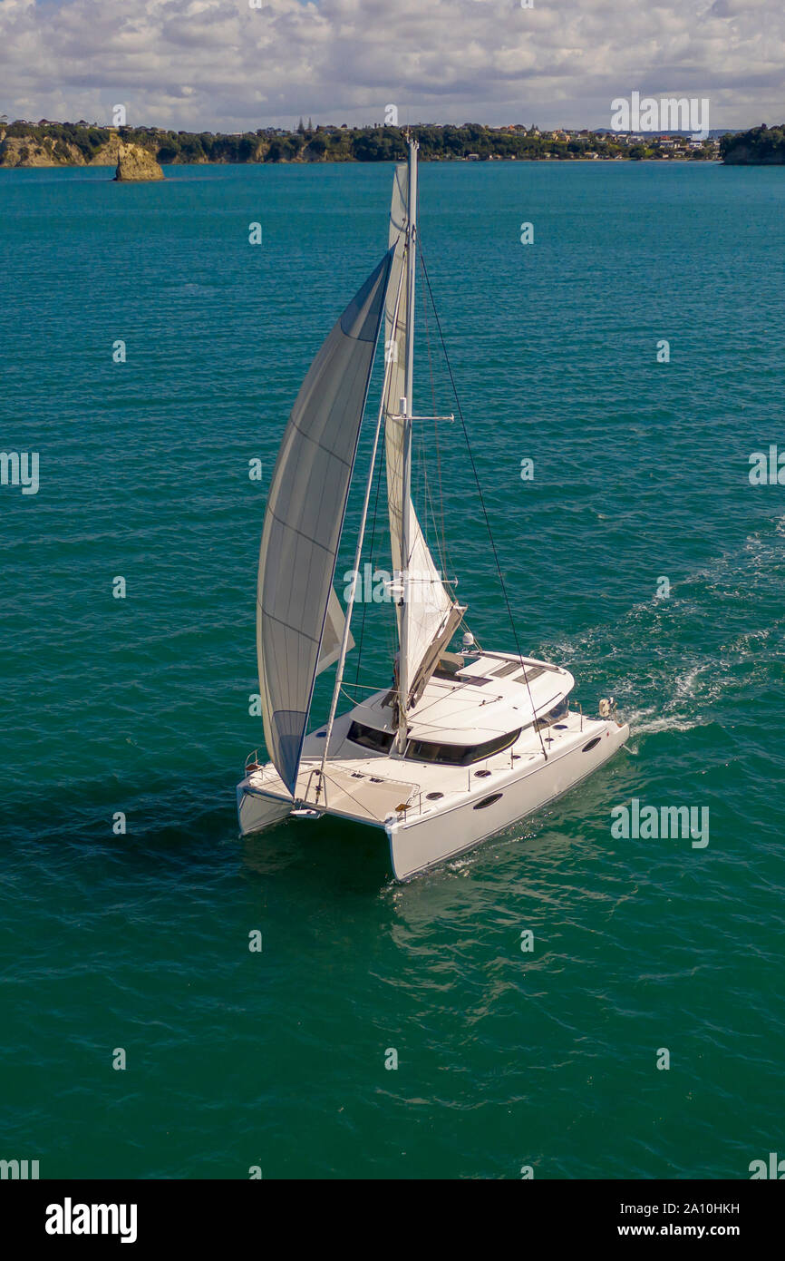 Cruising Catamaran sailing yacht under sail, shot from the air Stock ...