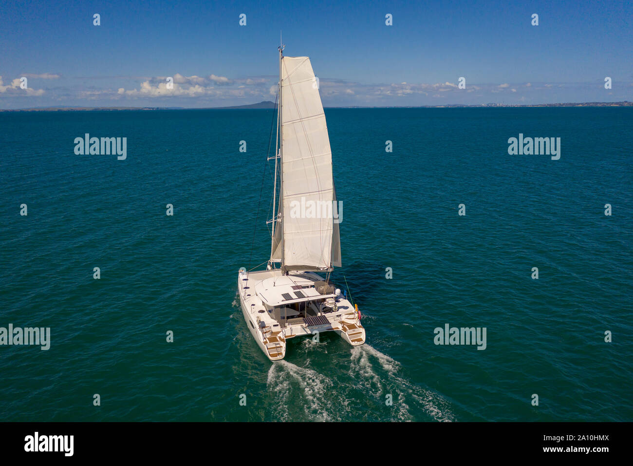 Cruising Catamaran sailing yacht under sail, shot from the air Stock ...