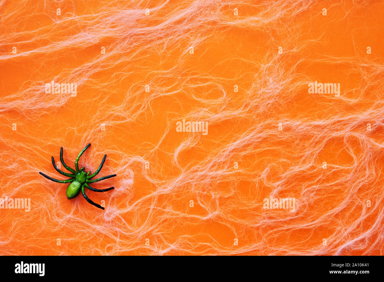 White spider web on orange background. Halloween concept. Scary ...