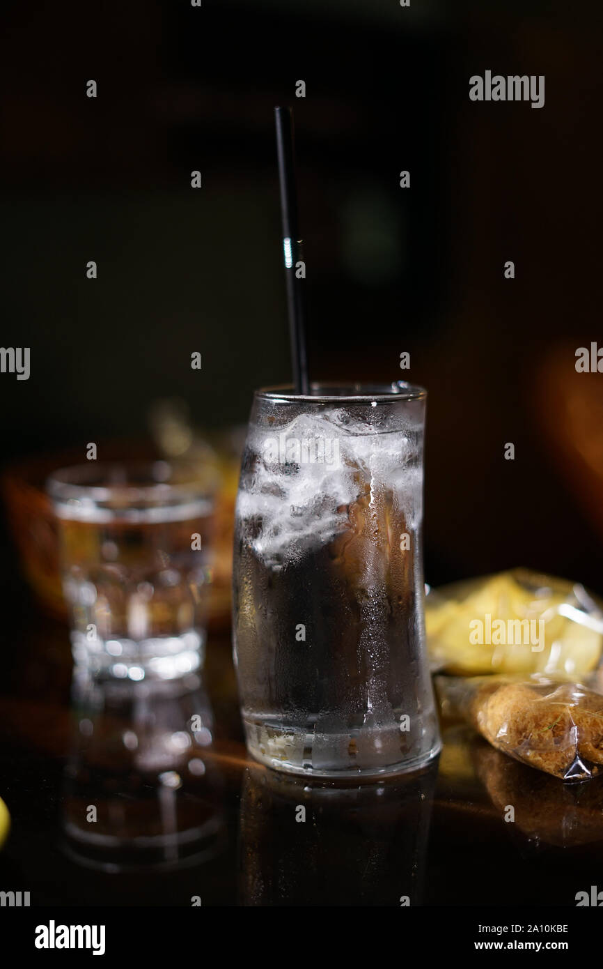 A glass of iced cold water on the bar table ready to drink Stock Photo ...