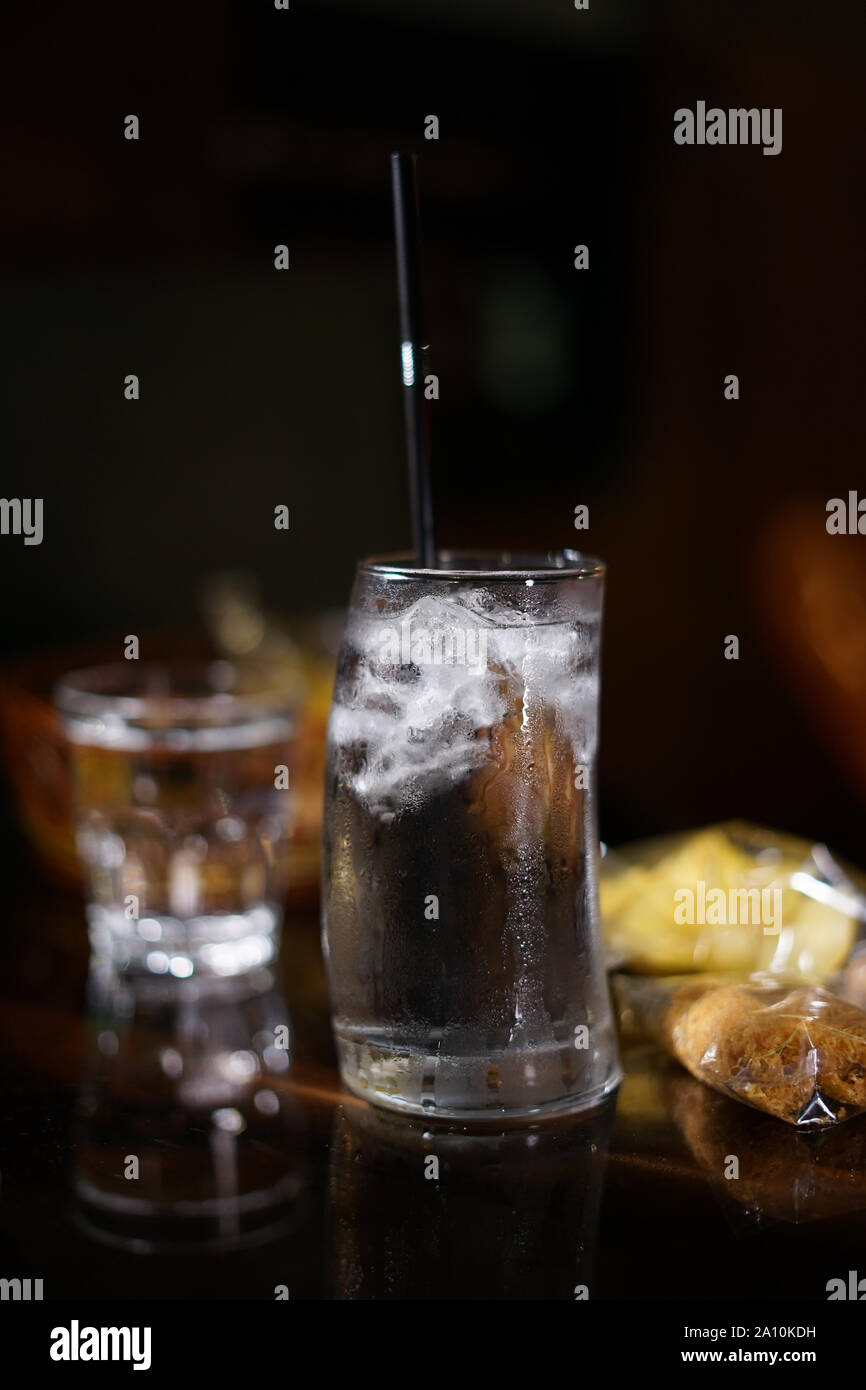 A glass of iced cold water on the bar table ready to drink Stock Photo ...