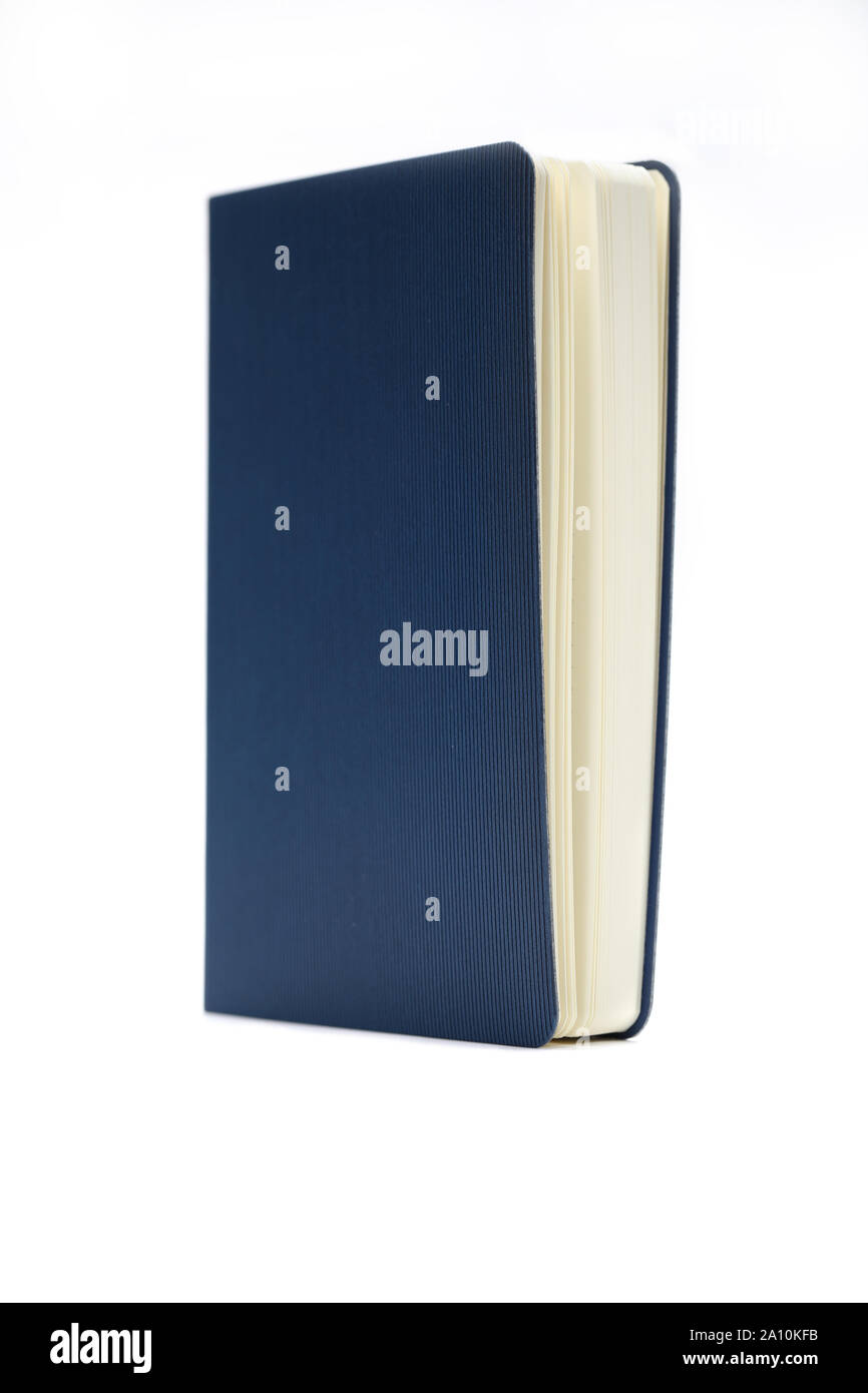 Blue diary isolated on white background Stock Photo - Alamy