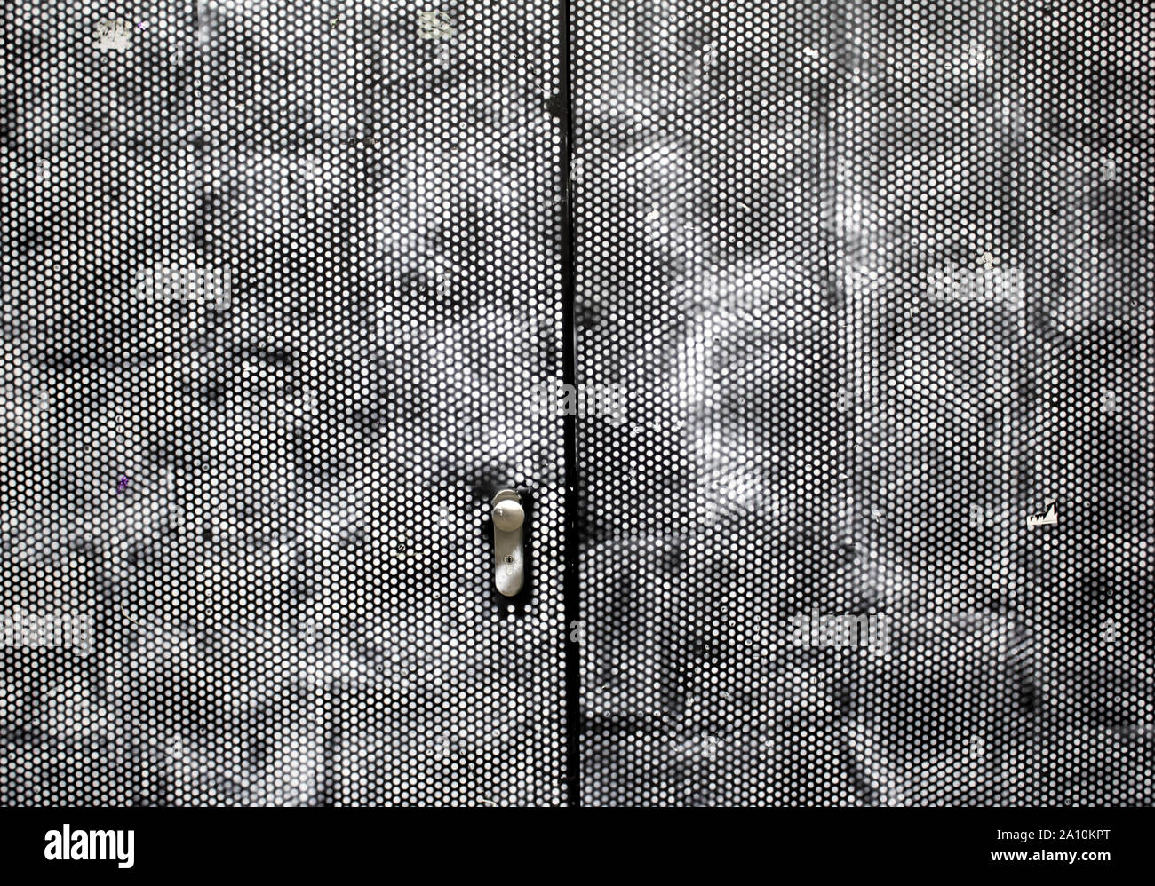 Spoiled and dirty metallic background, detail of a steel door down and ...