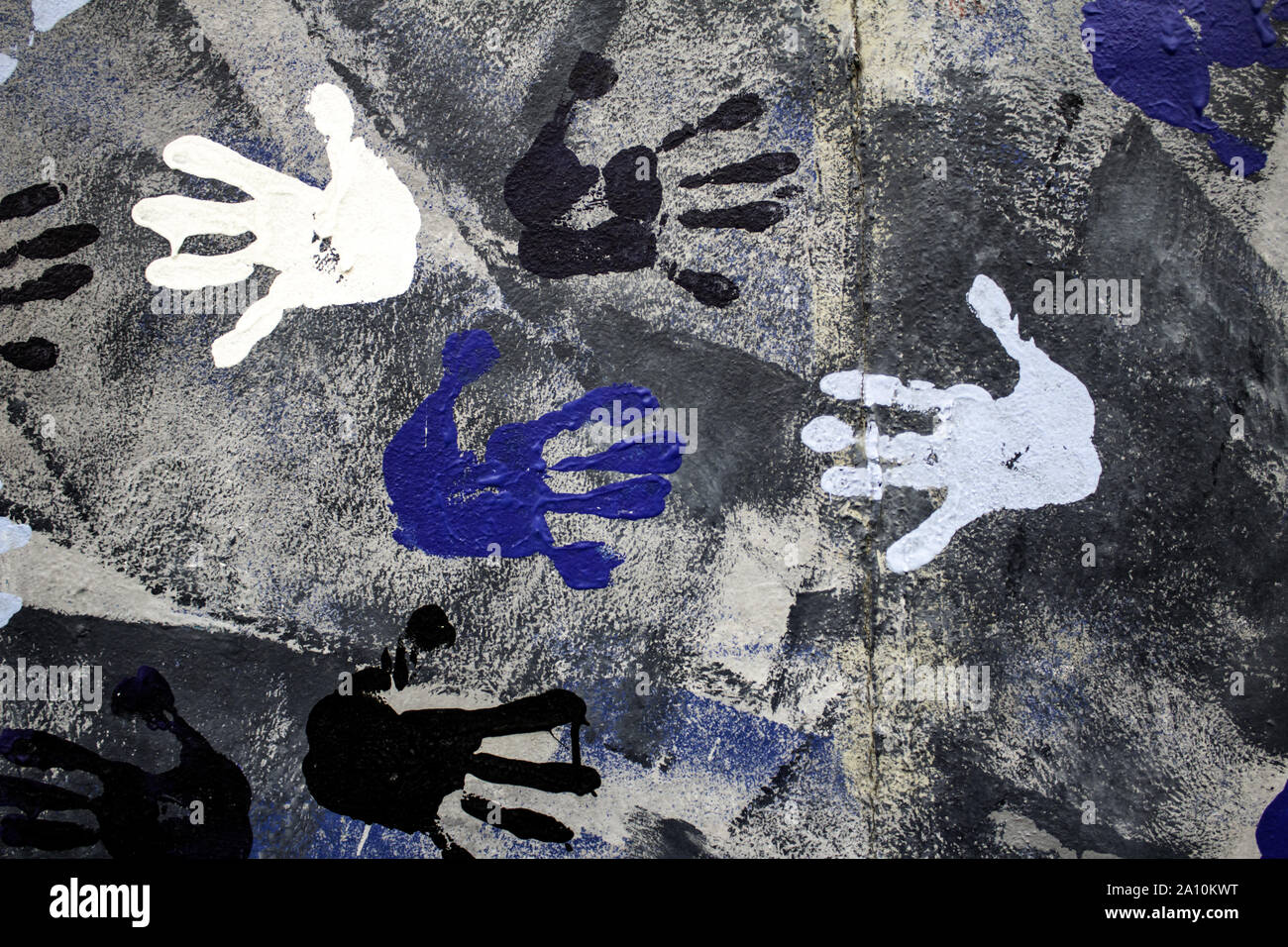 Footprints hand painted on wall, human symbol, peace Stock Photo - Alamy