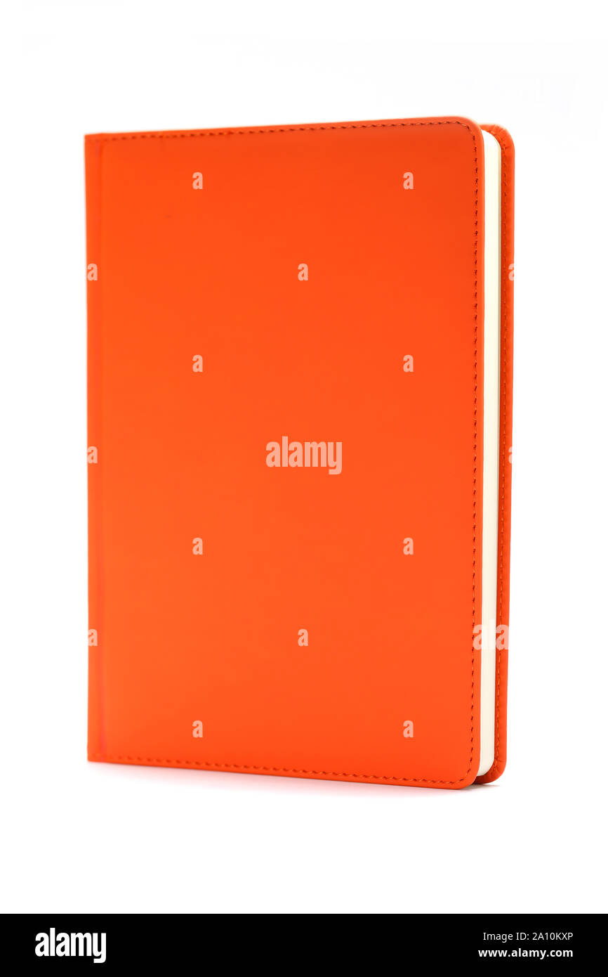 Orange diary isolated on white background Stock Photo - Alamy