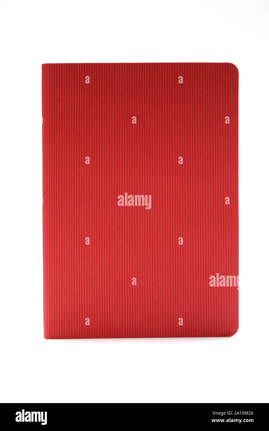 Red diary isolated on white background Stock Photo - Alamy