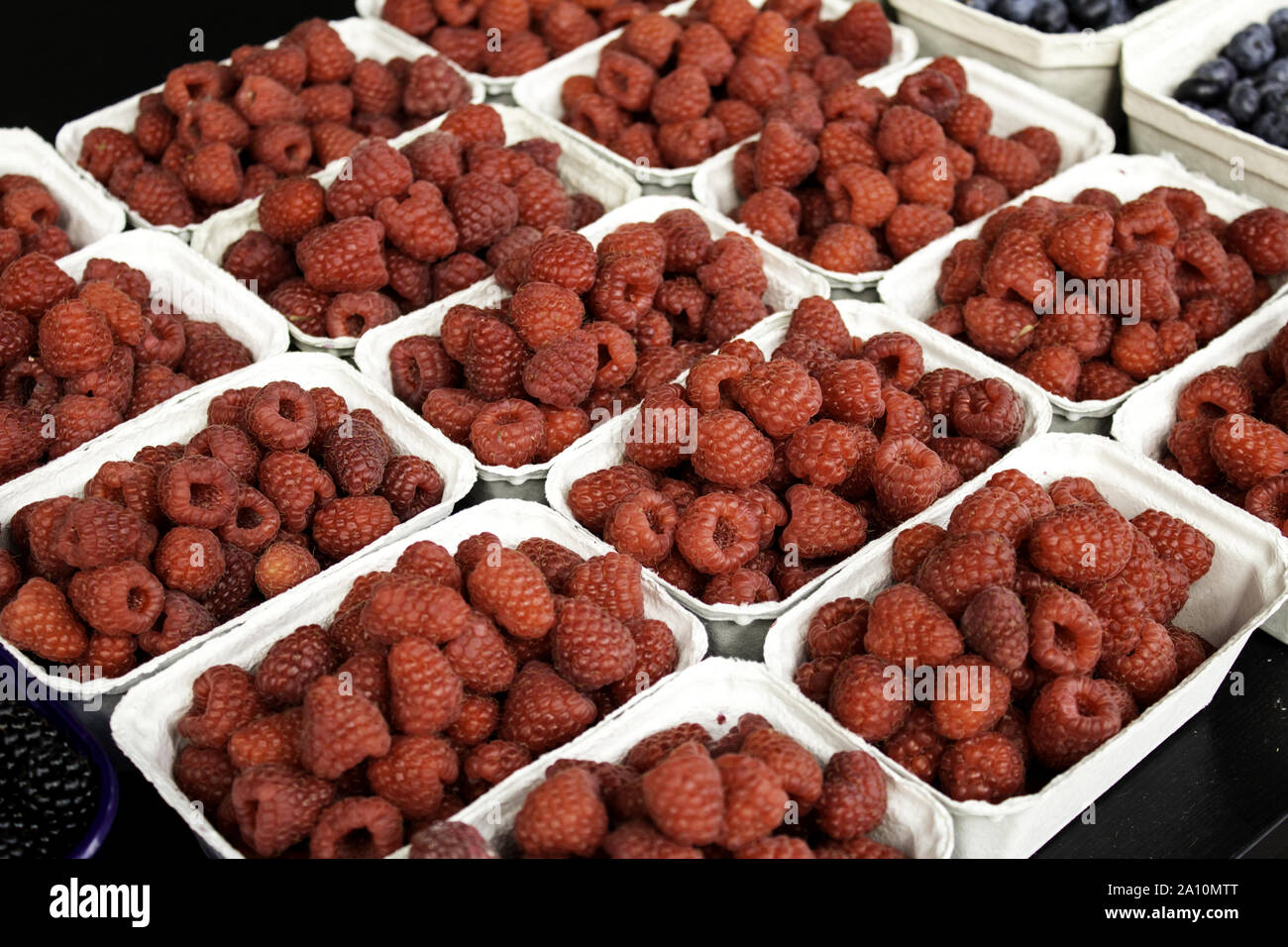Raspberries in food market, healthy food fruit Stock Photo - Alamy