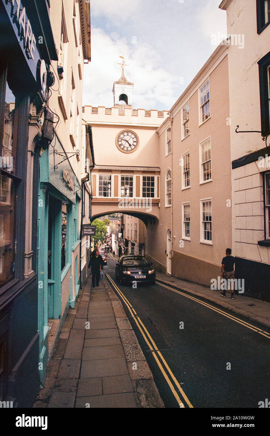 East Gate Tudor arch and clock tower in the High Street of Totnes ...