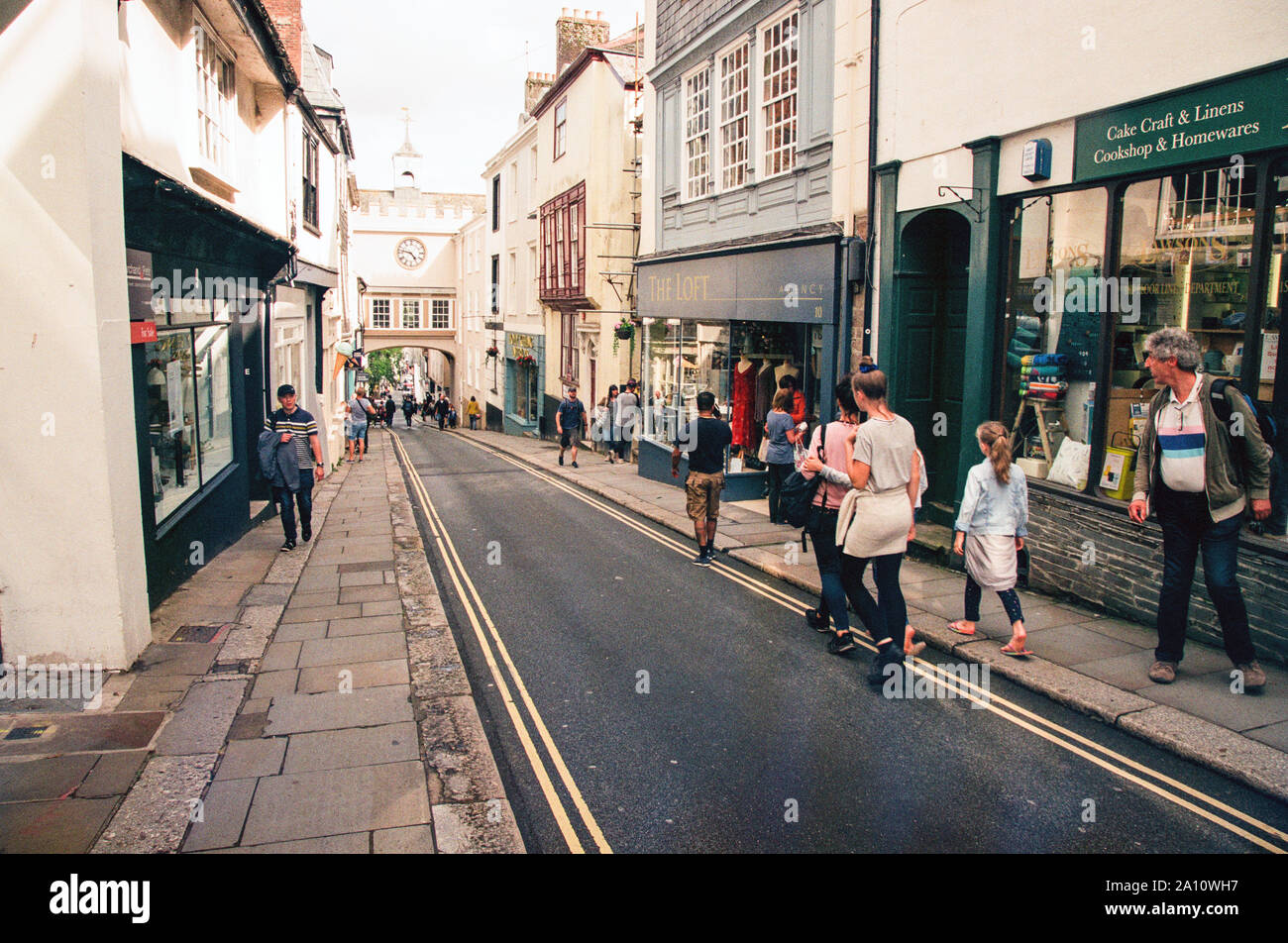 East Gate Tudor arch and clock tower in the High Street of Totnes ...