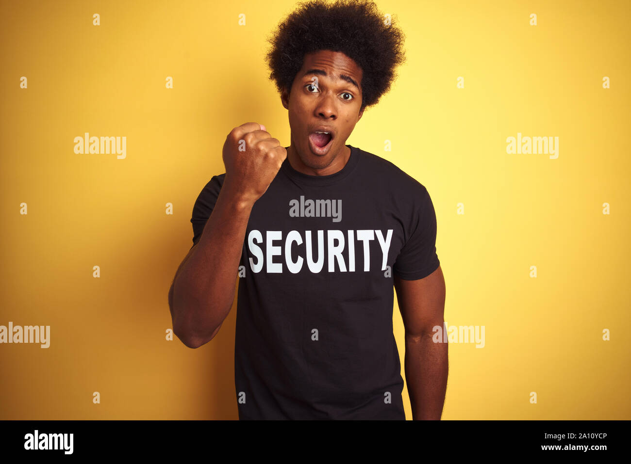 American safeguard man with afro hair wearing security uniform over ...
