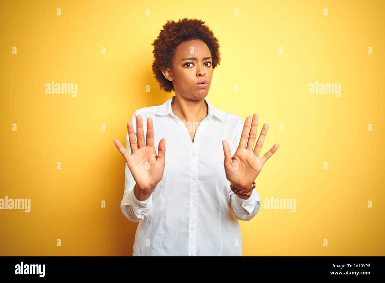 African american business woman over isolated yellow background Moving ...