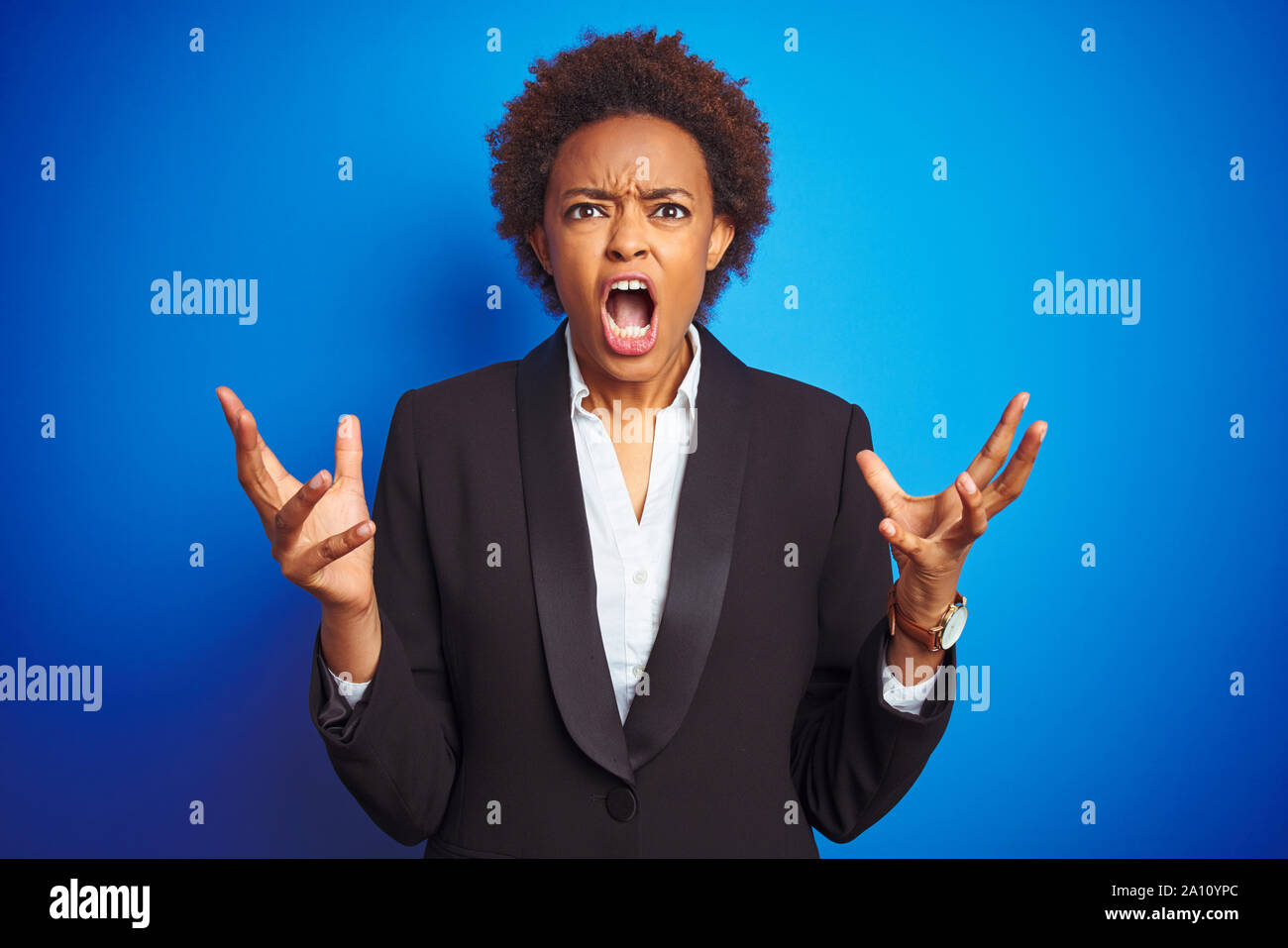 African american business executive woman over isolated blue background ...