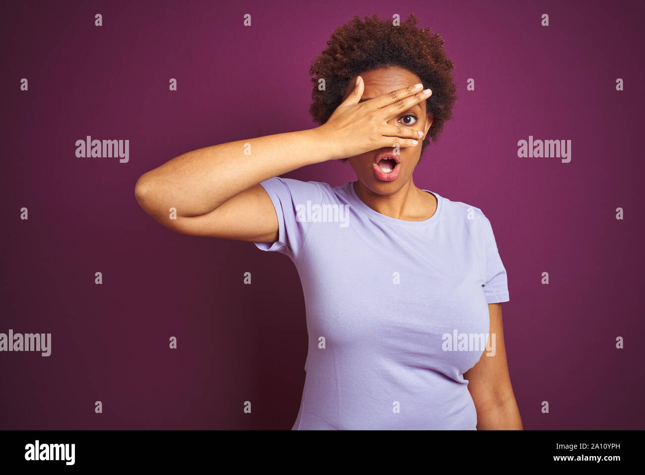 Young beautiful african american woman with afro hair over isolated ...