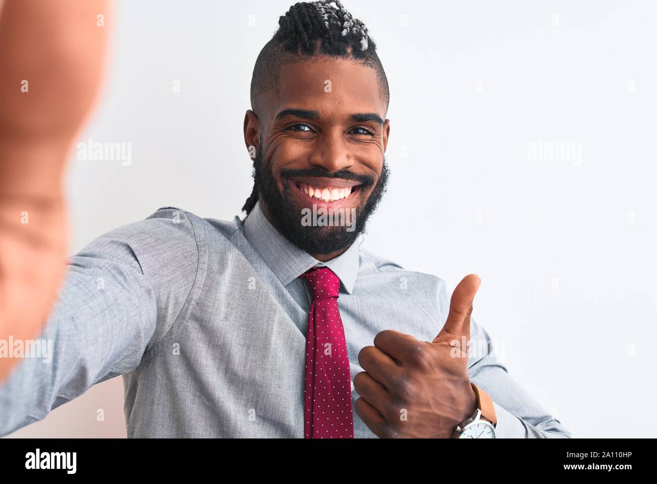 African american businessman make selfie by camera over isolated white ...