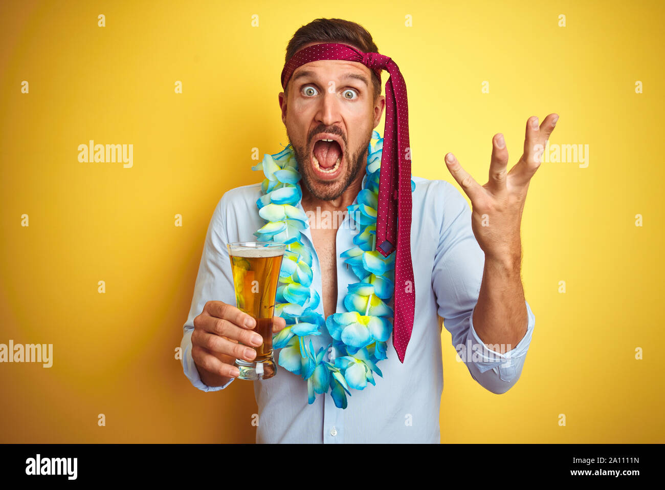 Hangover business man drunk and crazy for hangover wearing tie on head ...