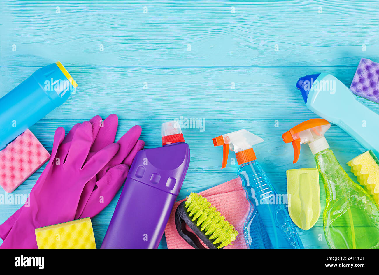 Cleaning service concept. Colorful cleaning set for different surfaces ...