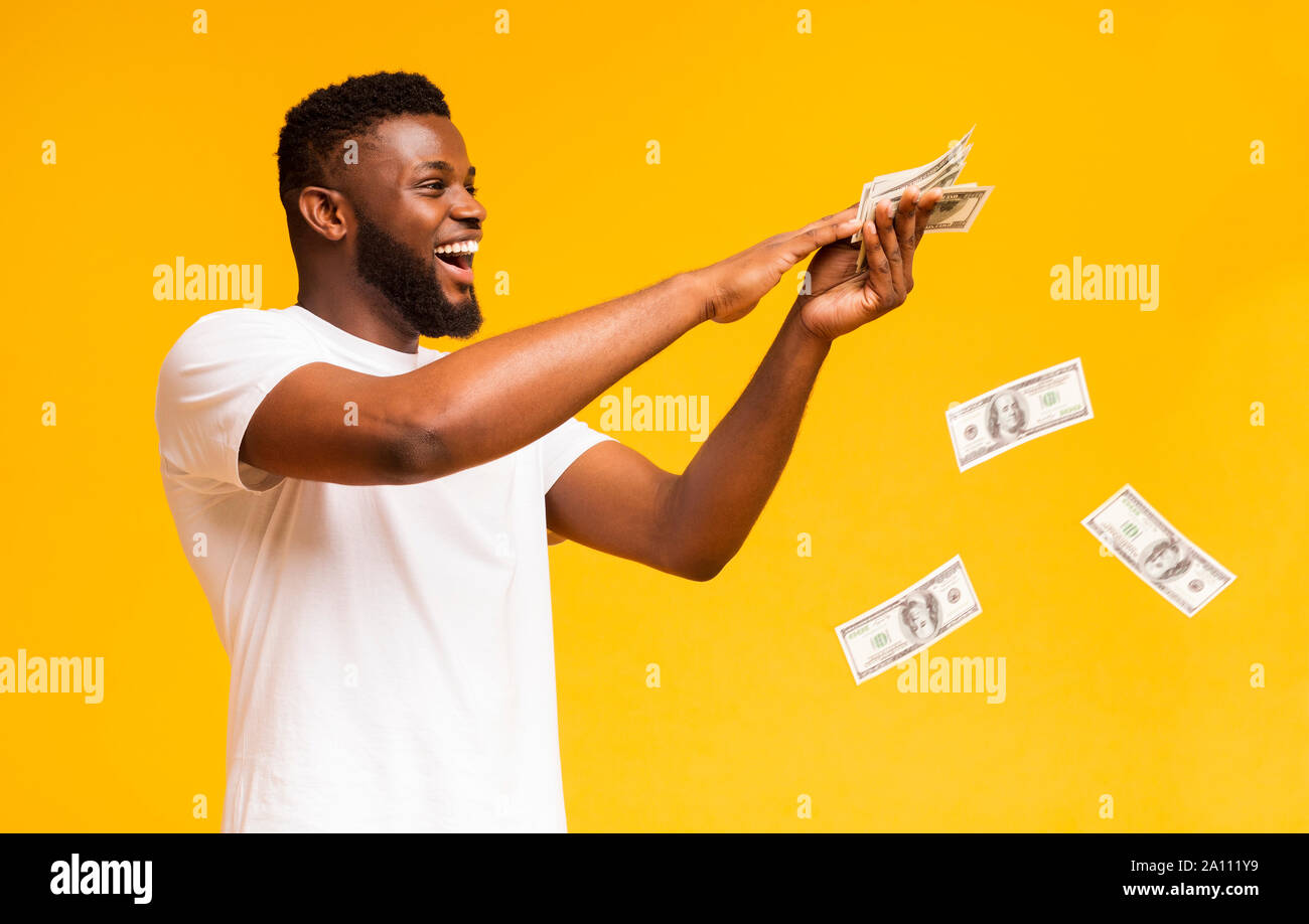 Young business throwing money concept hi-res stock photography and ...