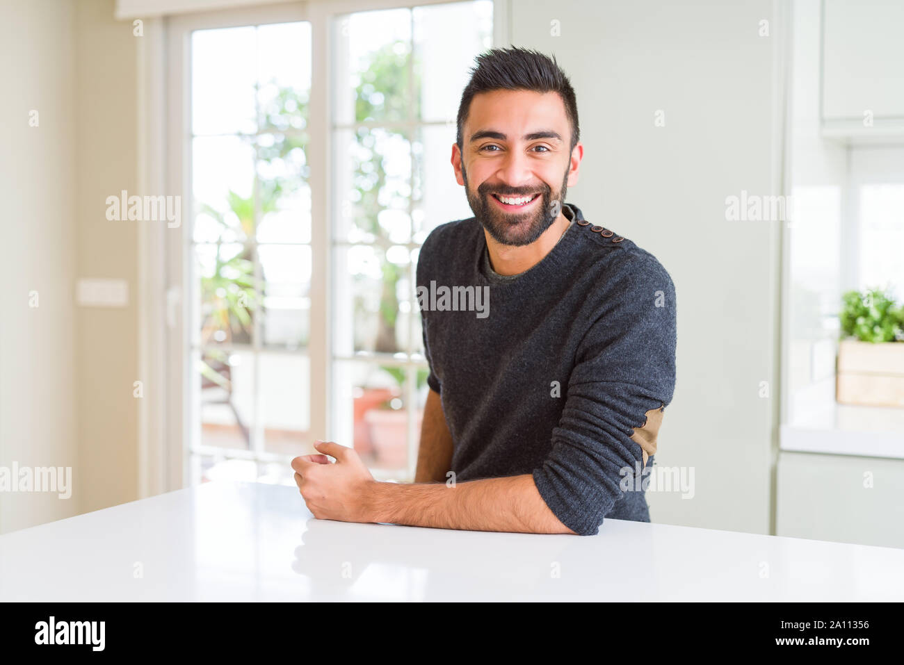 Handsome man smiling cheerful with a big smile on face showing teeth ...