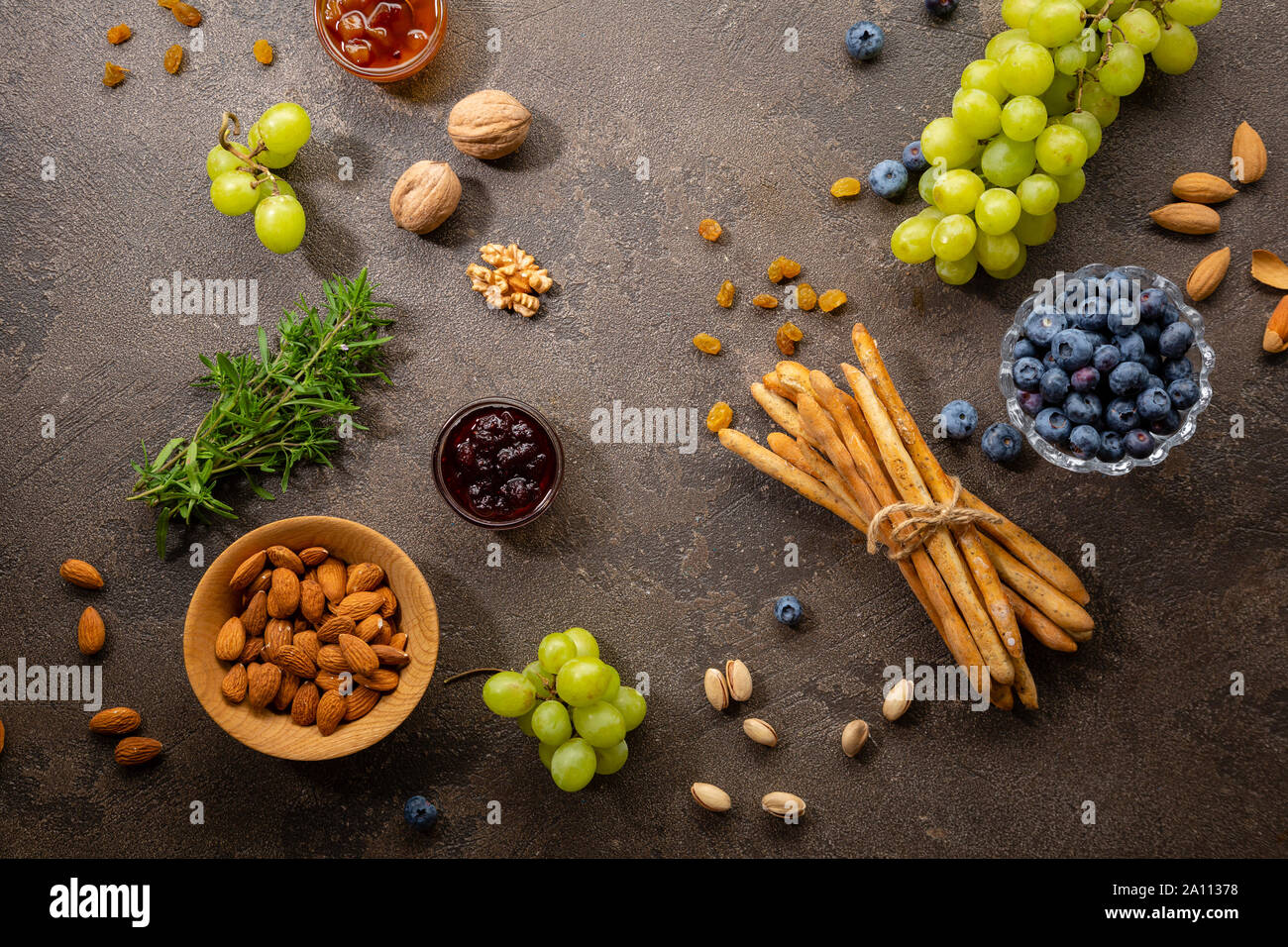 Healthy food background, nuts and fruits Stock Photo - Alamy