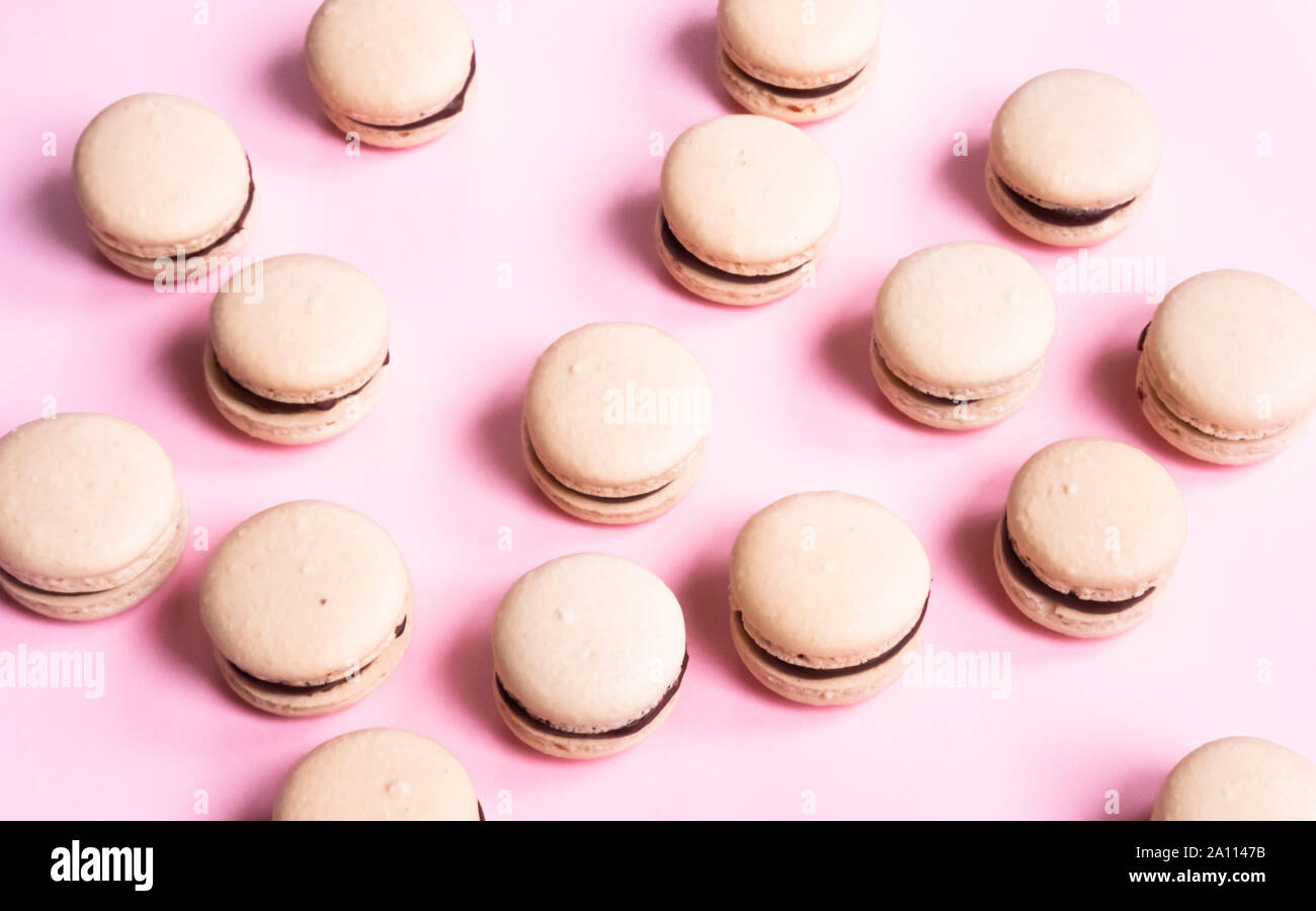 Pink macaroons background Stock Photo - Alamy
