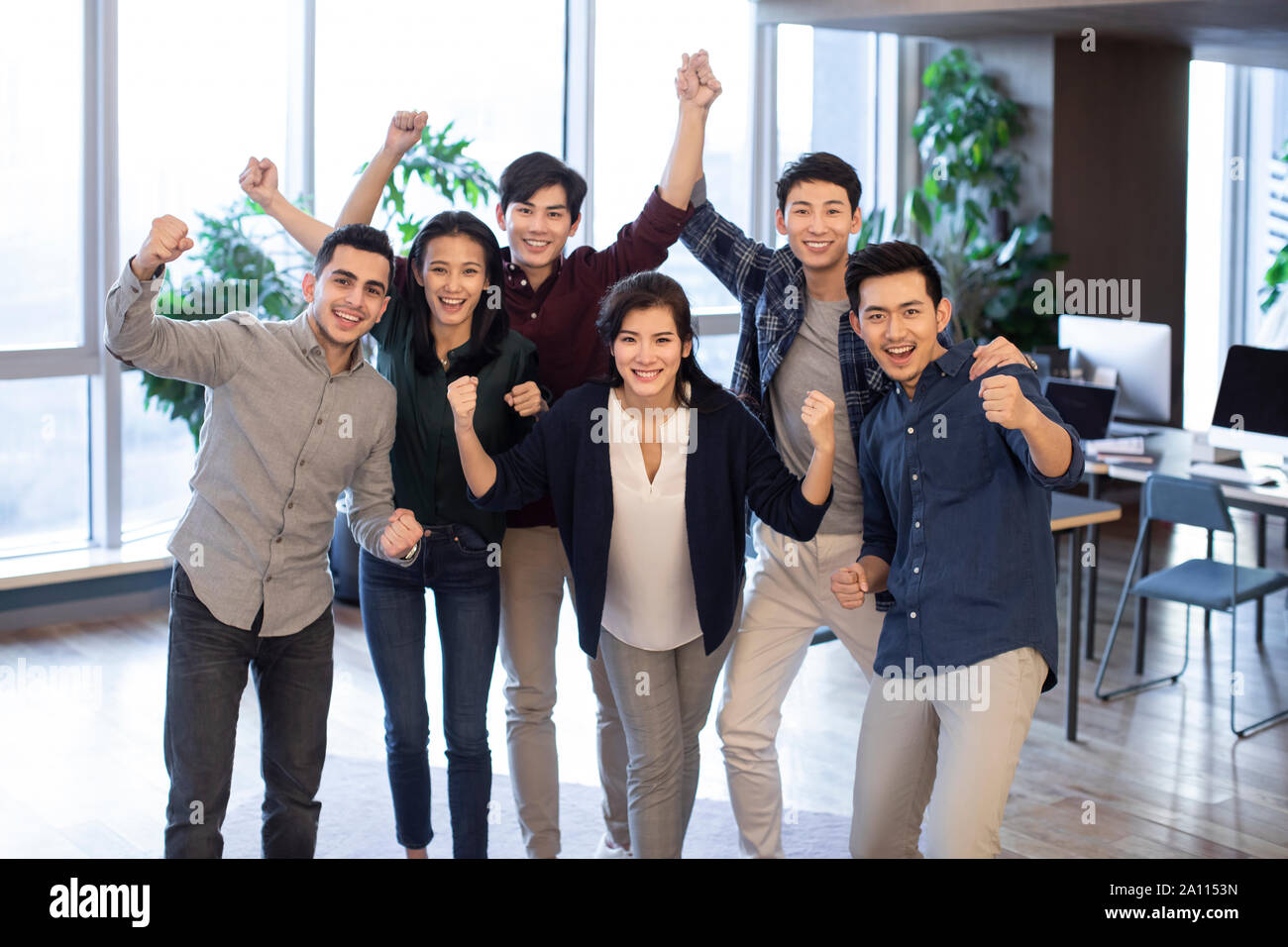 Students cheering in classroom hi-res stock photography and images - Alamy