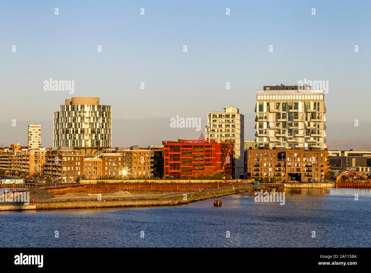 Reclaiming land from the sea in Copenhagen harbour, Denmark Stock Photo ...