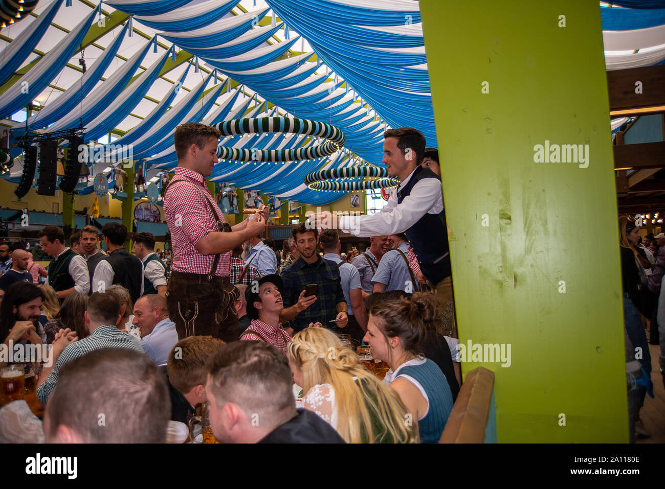 Munich,Germany-September 21,2019: People eat and drink inside one of ...