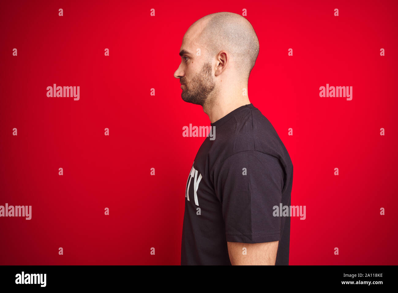 Young safeguard man wearing security uniform over red isolated ...