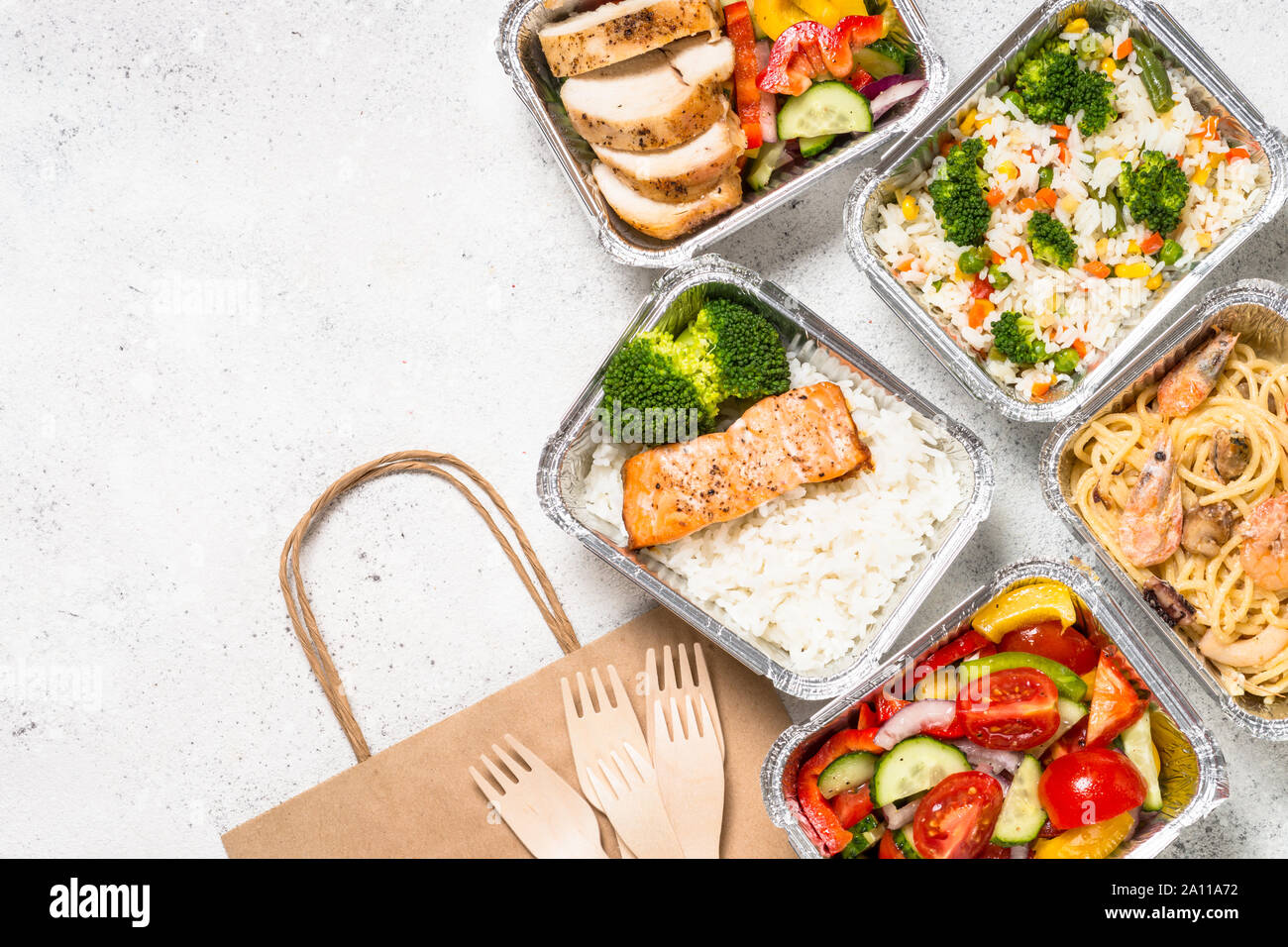 Food delivery concept - healthy lunch in boxes Stock Photo - Alamy