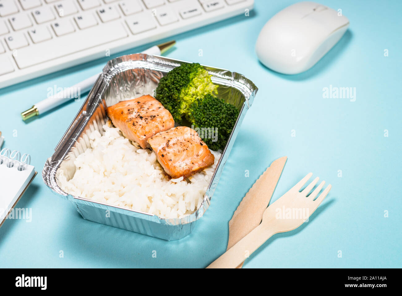 Food delivery concept - healthy lunch on office table Stock Photo - Alamy