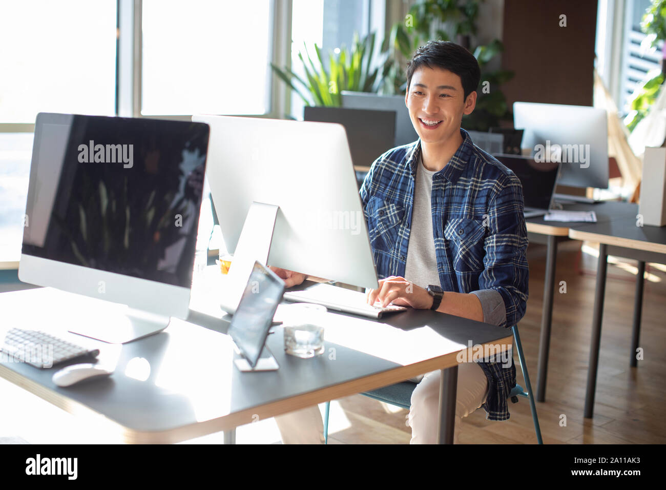 Young college student using computer Stock Photo - Alamy