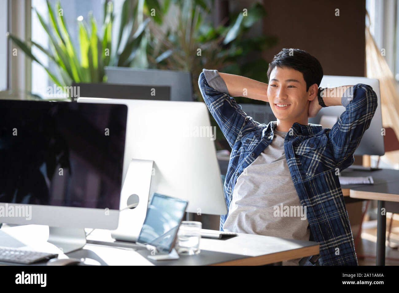 Young college student using computer Stock Photo - Alamy