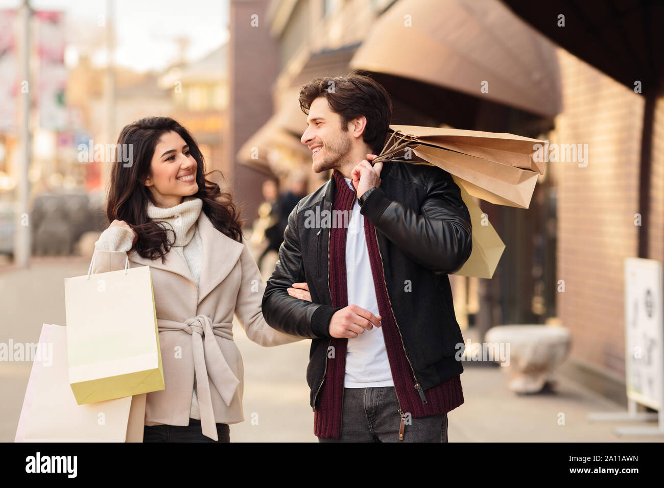 Man looking woman after street hi-res stock photography and images - Alamy
