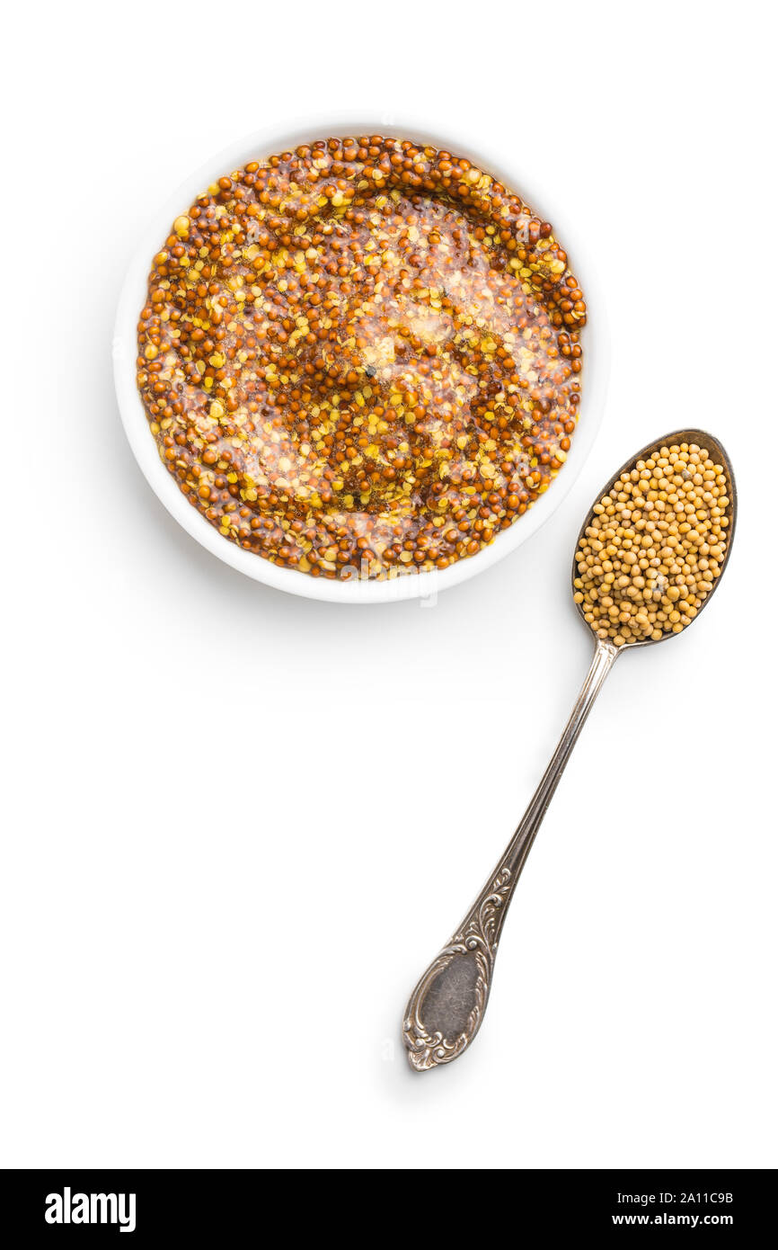 Whole grain mustard and mustard seeds isolated on white background ...