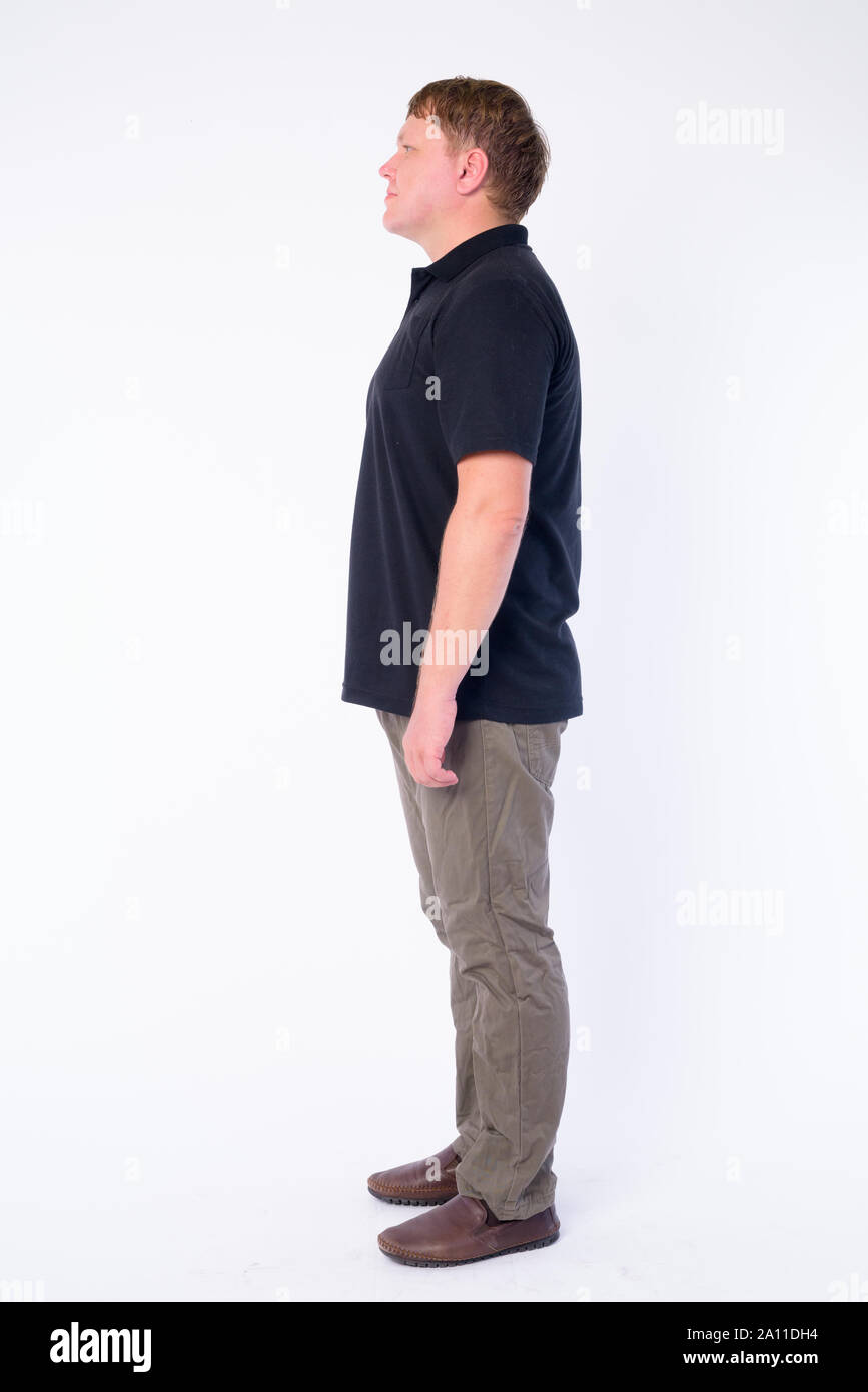 Full body shot profile view of overweight man Stock Photo - Alamy