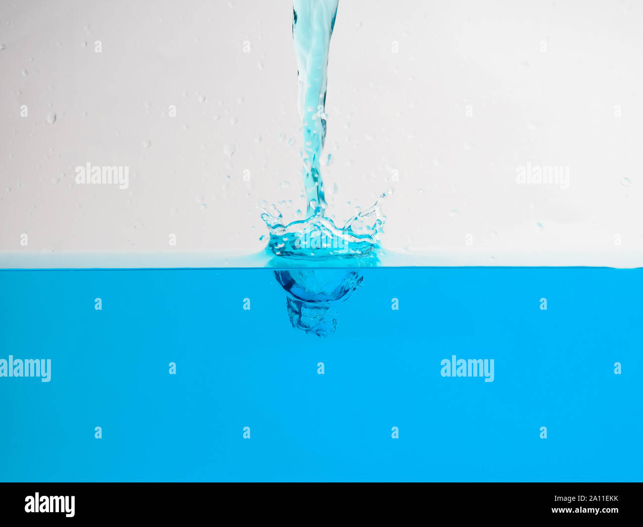 Water Splash or water wave with bubbles of air on the background ...