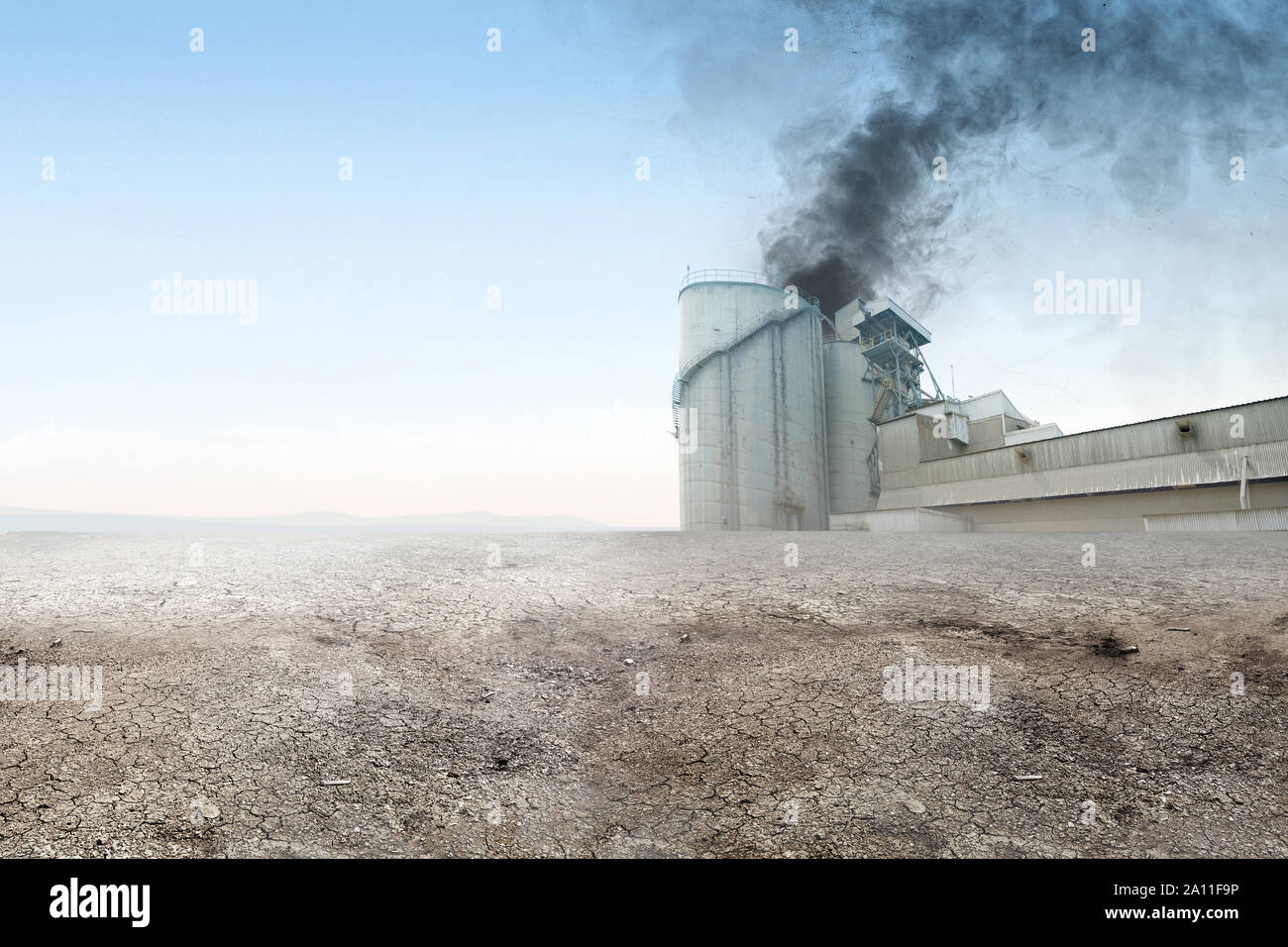Industrial factory smoke cause pollution on the air on the drought land ...