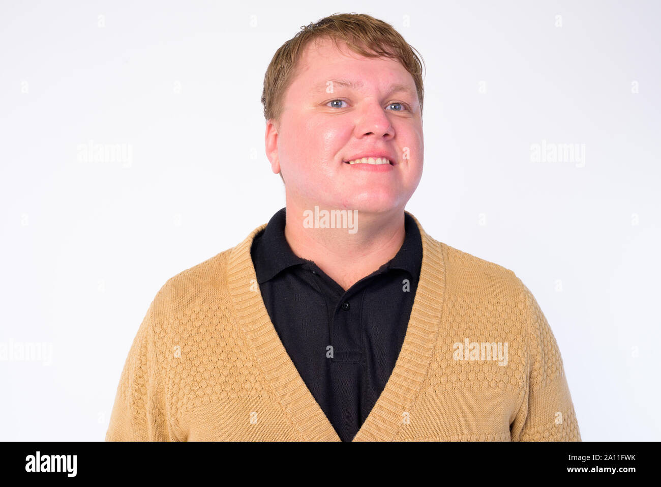 Face of happy overweight man thinking and looking up Stock Photo - Alamy