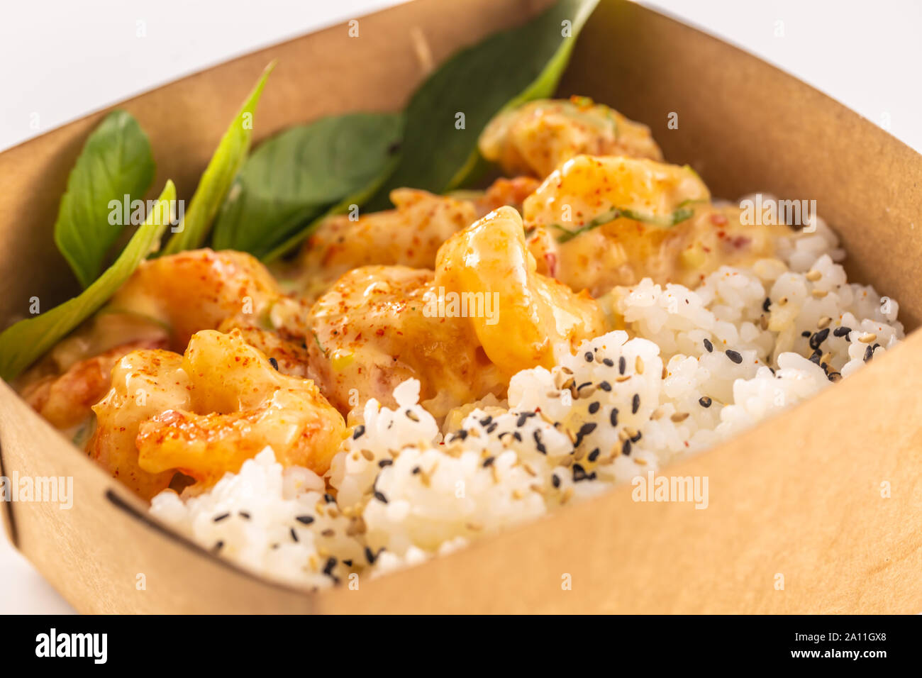 Japanese asian meal in a box of recycled paper isolated on white ...