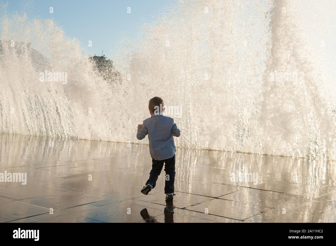 panic of child escaping from huge high wave during storm weather in ...