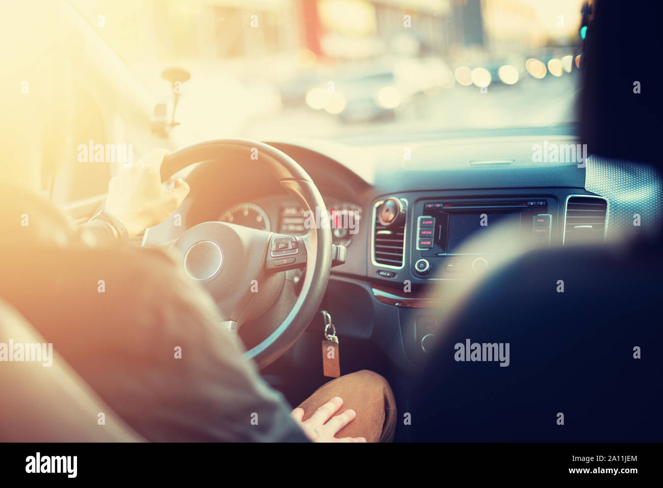 Business man driving his car. Blurred travel background with vintage ...