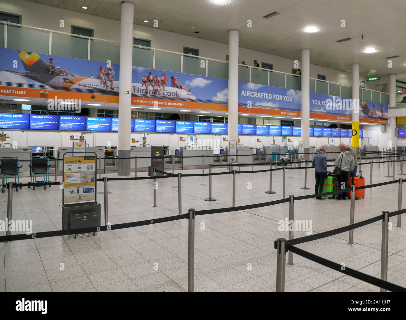 Empty thomas cook check in desks gatwick airport hi-res stock ...