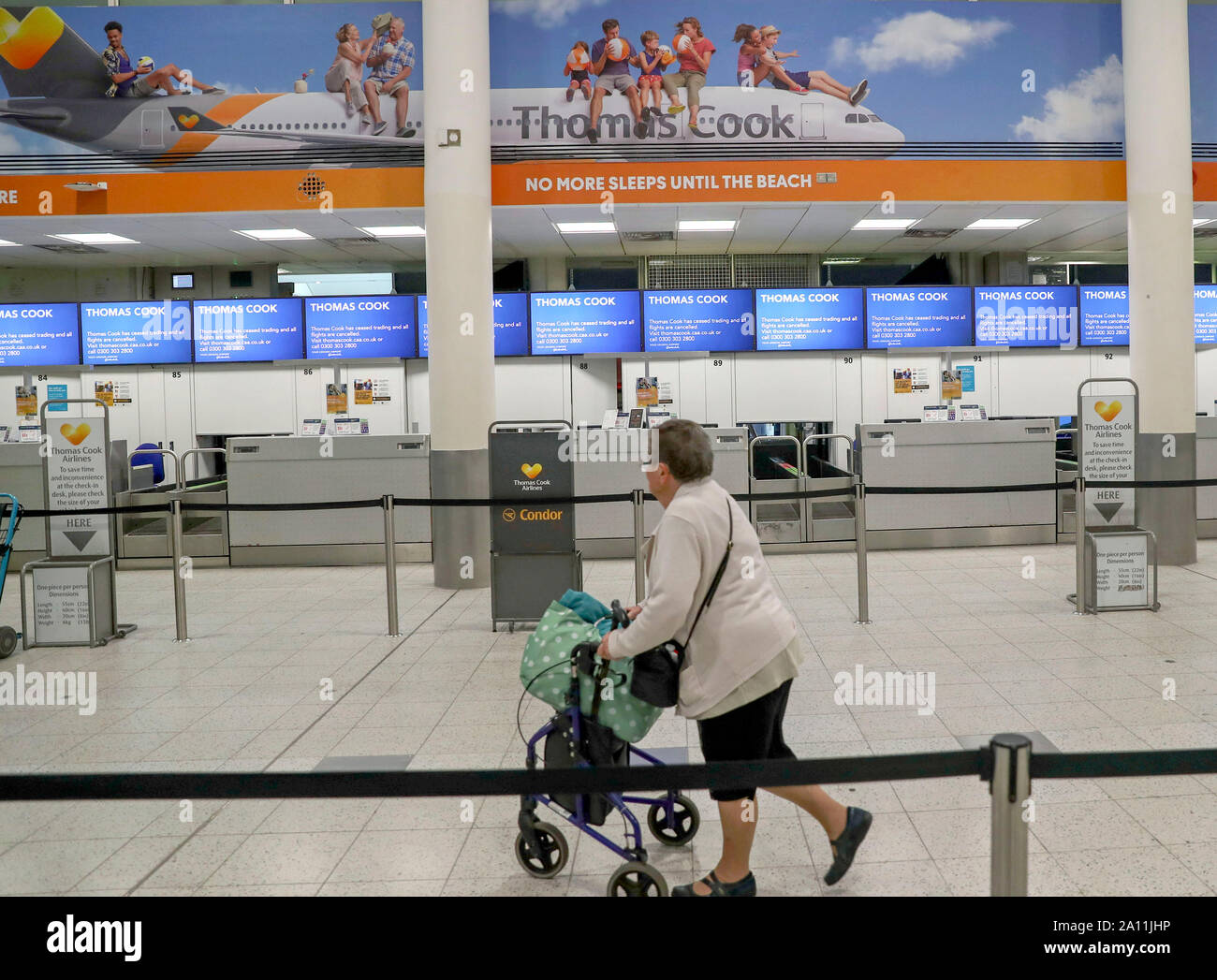 Empty thomas cook check in desks gatwick airport hi-res stock ...