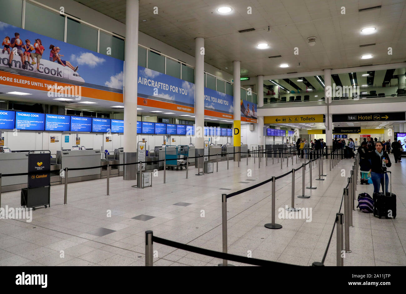Empty thomas cook check in desks gatwick airport hi-res stock ...